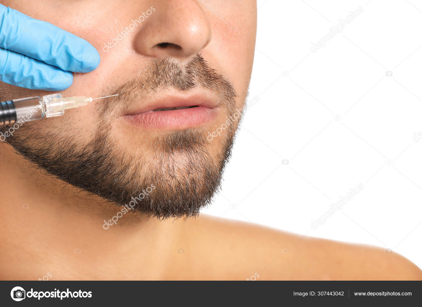 Handsome man receiving filler injection on white background, closeup ...