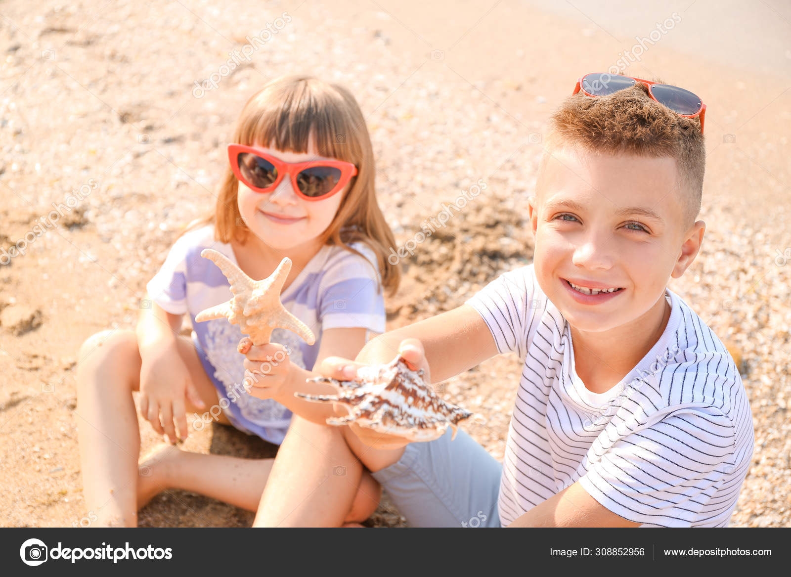 Children playing with shells on sea beach Stock Photo by ©serezniy ...