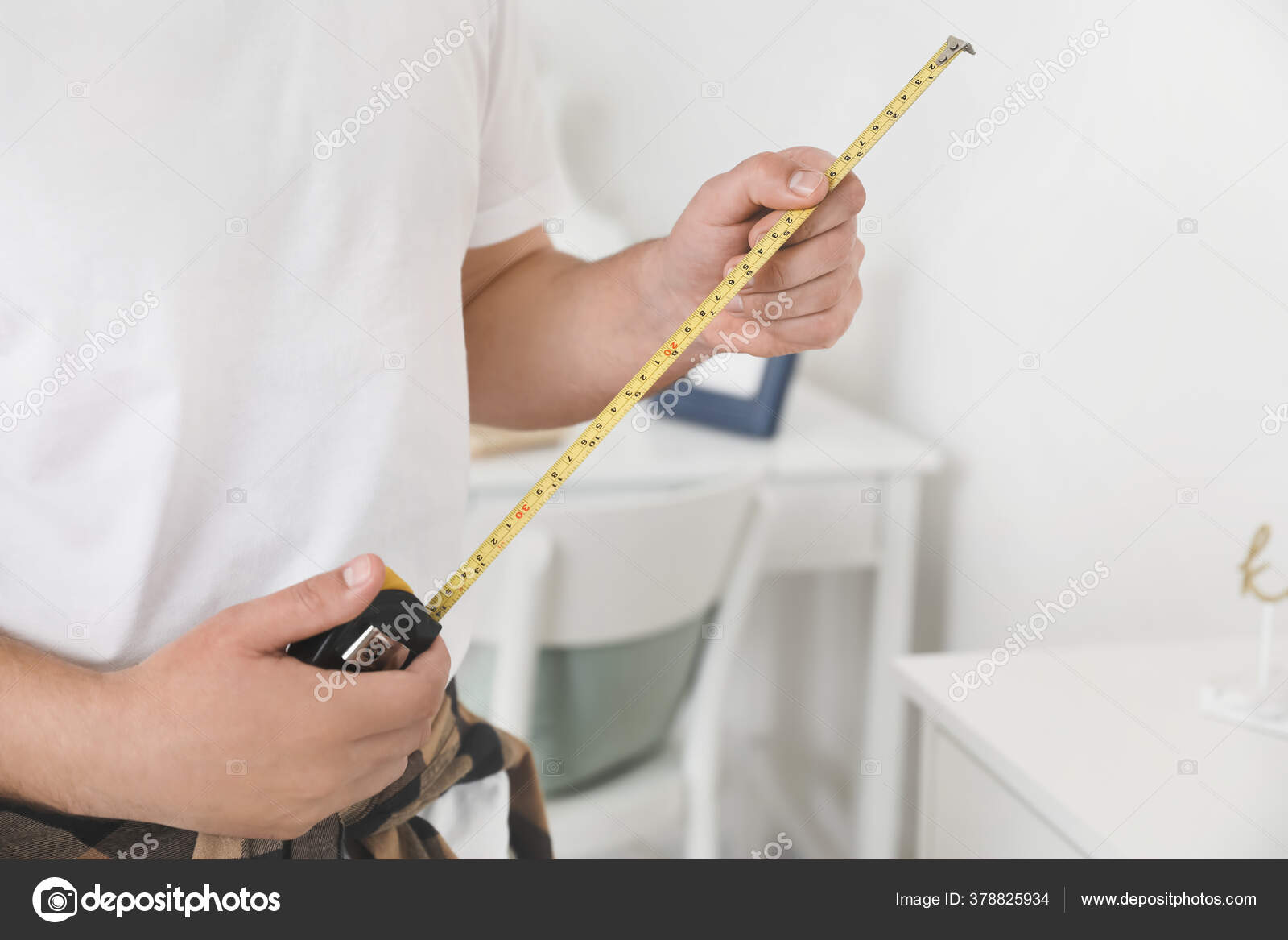 Male Carpenter Tape Measure Room Closeup Stock Photo by ©serezniy 378825934