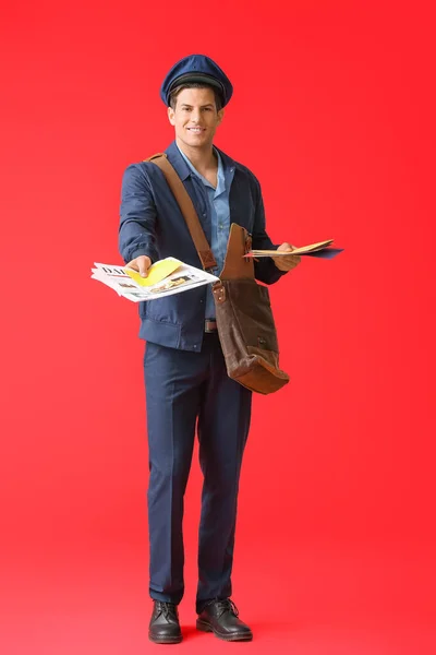 Handsome Young Postman Color Background Stock Photo by ©serezniy 378875910