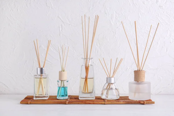 Different Reed Diffusers Table Room Stock Photo by ©serezniy 383169518