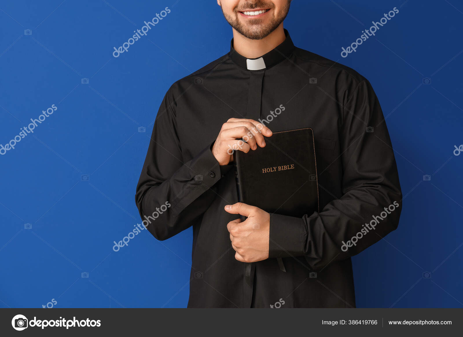 Young Priest Bible Color Background Stock Photo by ©serezniy 386419766