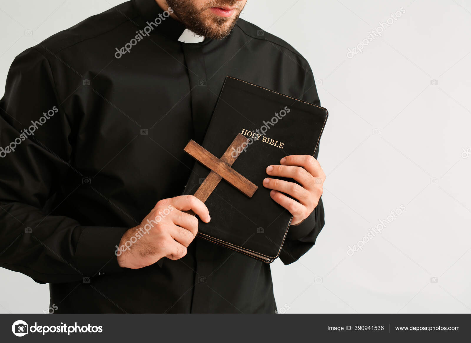 Young Priest Bible Light Background Stock Photo by ©serezniy 390941536