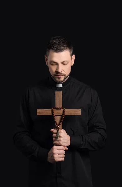 Handsome Praying Priest Dark Background Stock Photo by ©serezniy 391548696