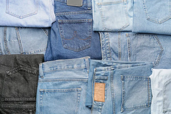 Stylish Jeans Pants Background — Stock Photo © serezniy #396787550