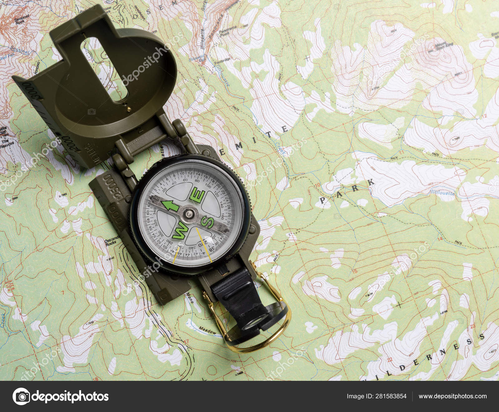 A compass on a map Stock Photo by ©miflippo 281583854