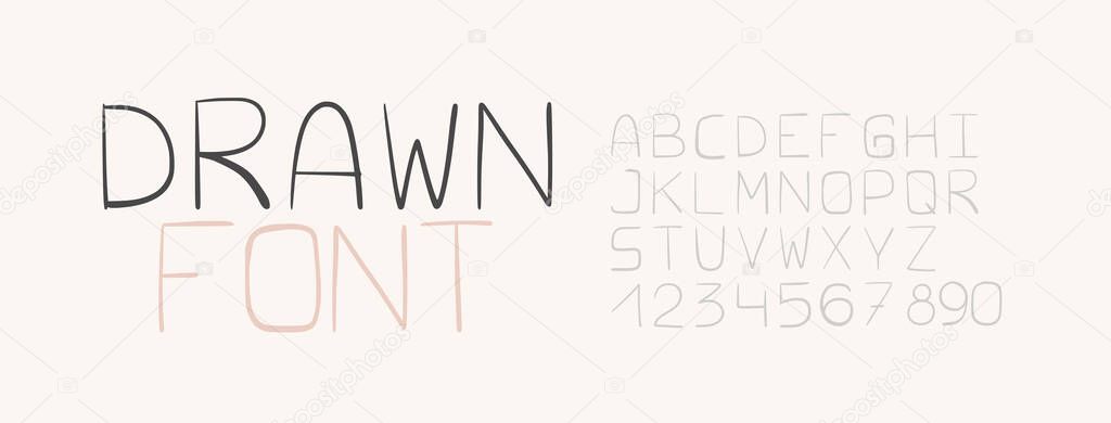 Set of fine contour alphabet letters and numbers over green paper ...