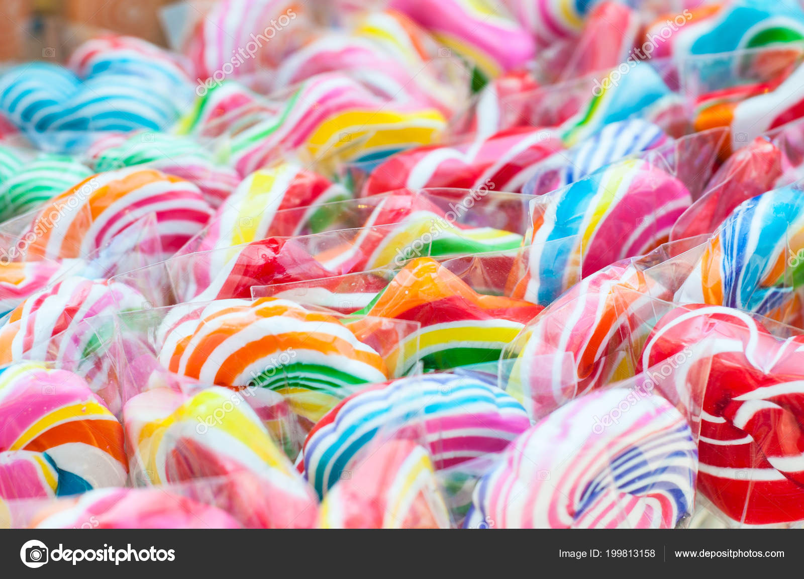 Colorful Packed Candies Background Stock Photo by ©gluber 199813158