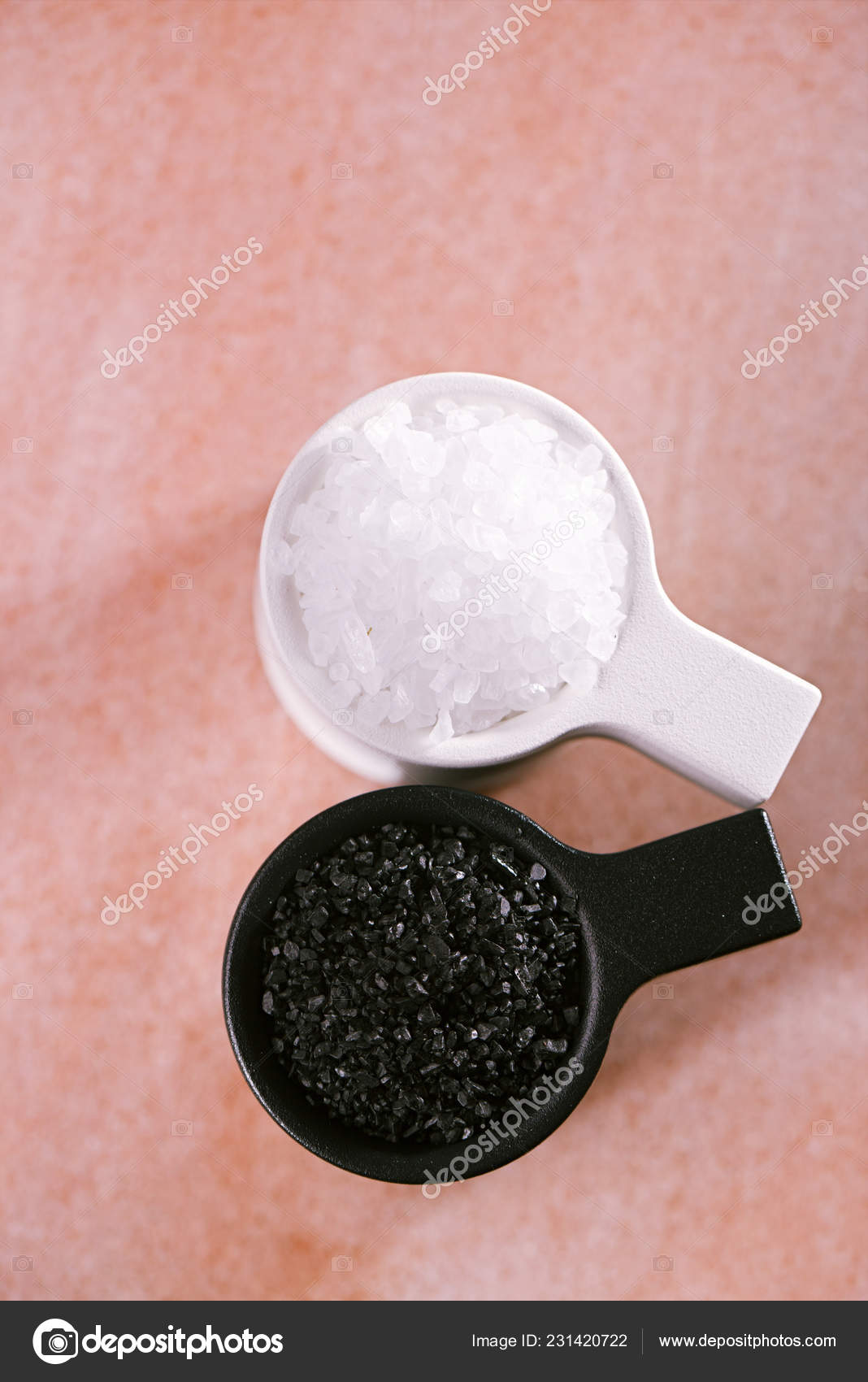 White Crystal Rock Salt Hawaiian Black Lava Sea Salt Cups Stock Photo ...