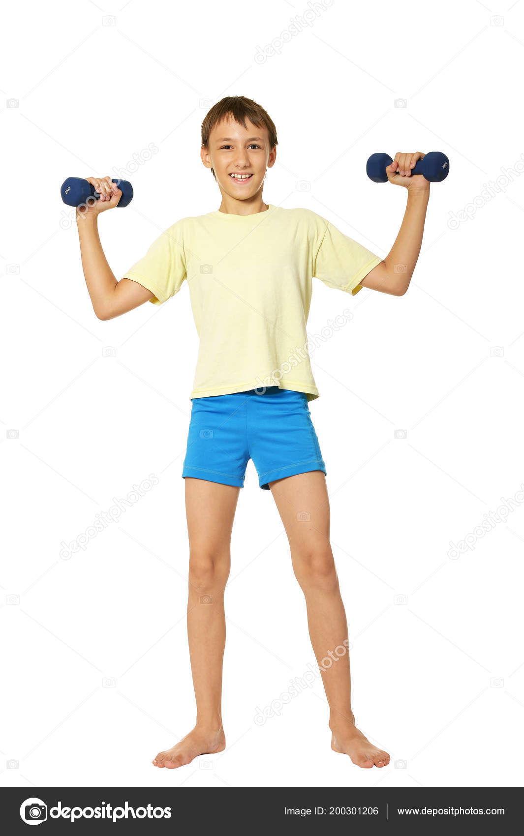 Young boy doing exercises — Stock Photo © aletia #200301206