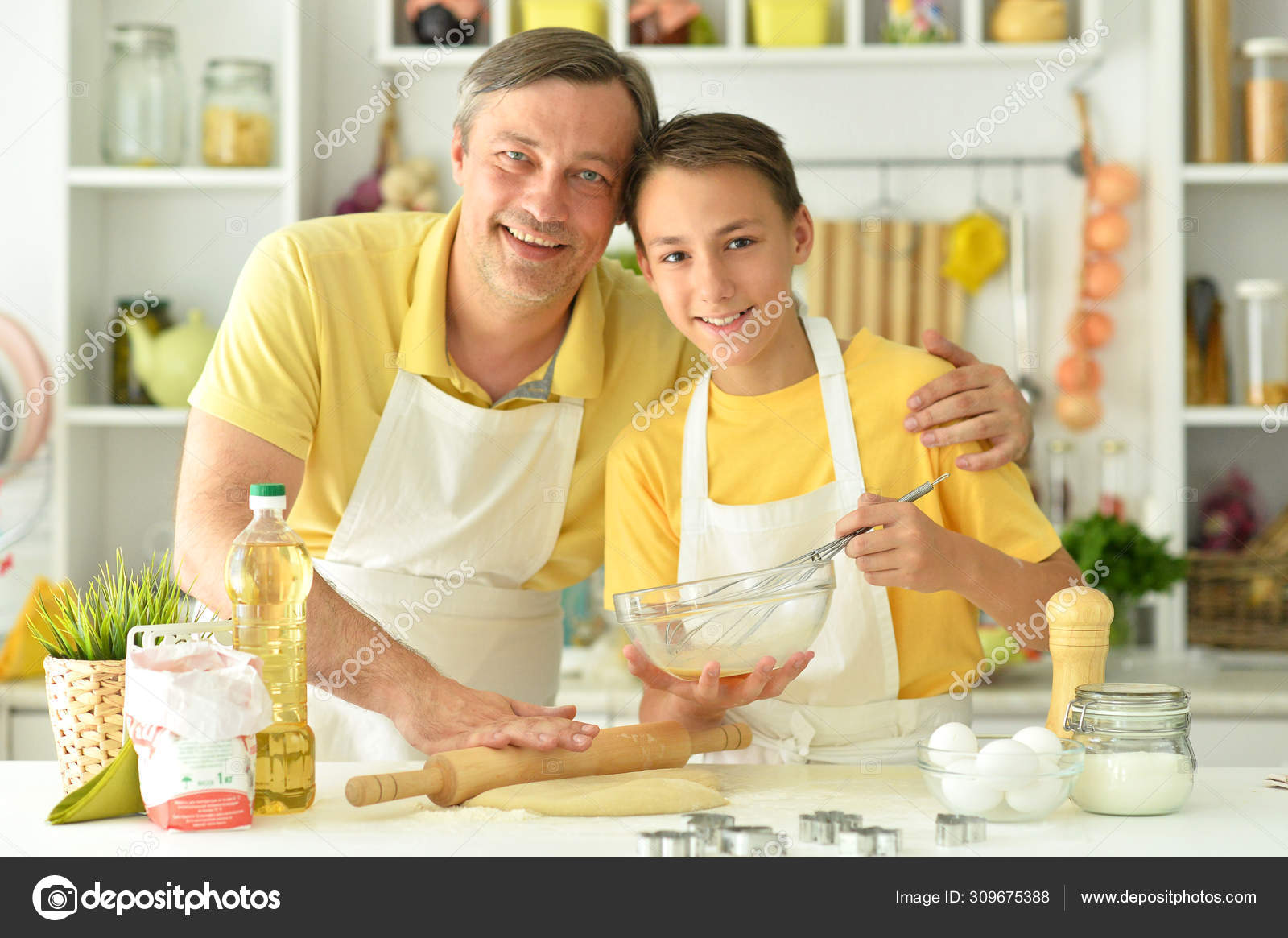 Young Boy Father Baking Cookies Stock Photo by ©aletia 309675388
