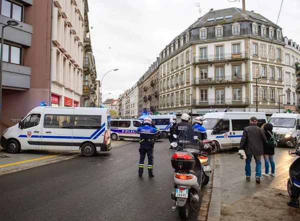 Police officers securing the zone in front of Yellow Jackets Gil ...