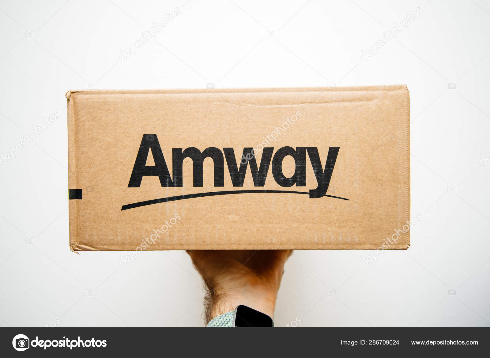 Cardboard parcel box with Amway logotype – Stock Editorial Photo ...