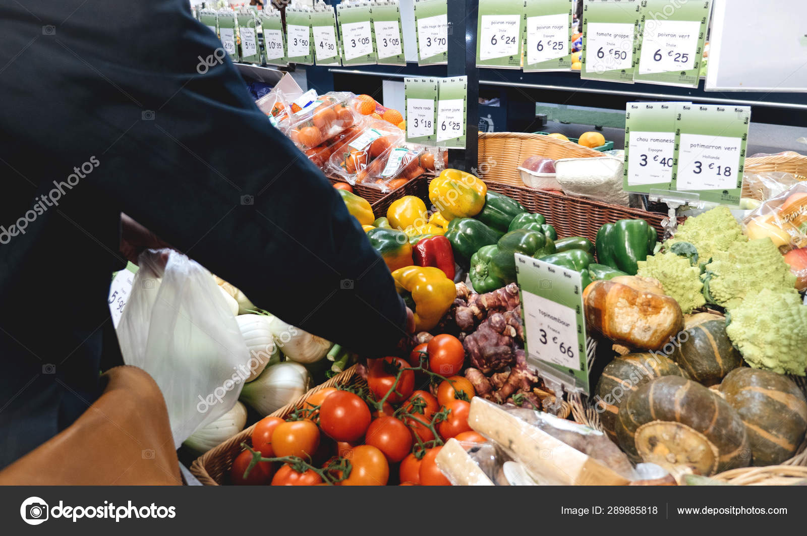 Woman shopping for fruits vegetables at supermarket in France — Stock ...