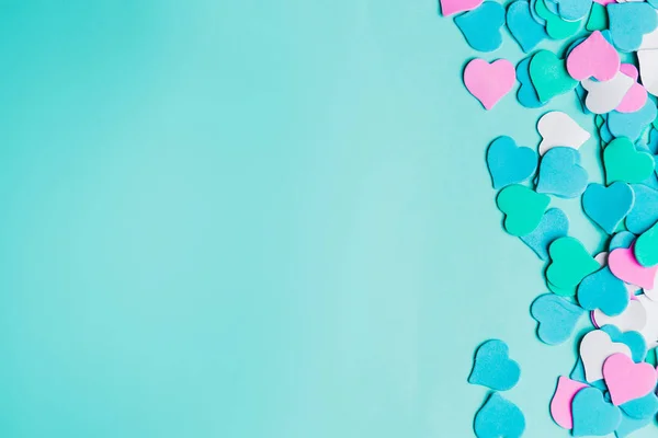 Top view blue paper background with small hearts with copy space for ...