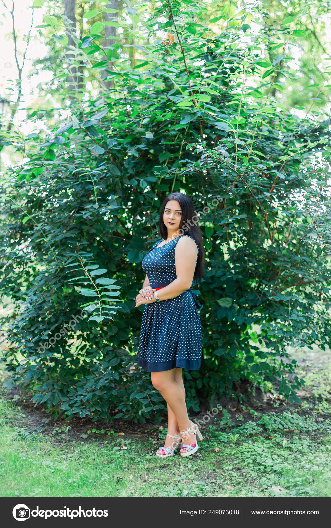 Plus size fashion model in casual clothes, overweight female body in a ...