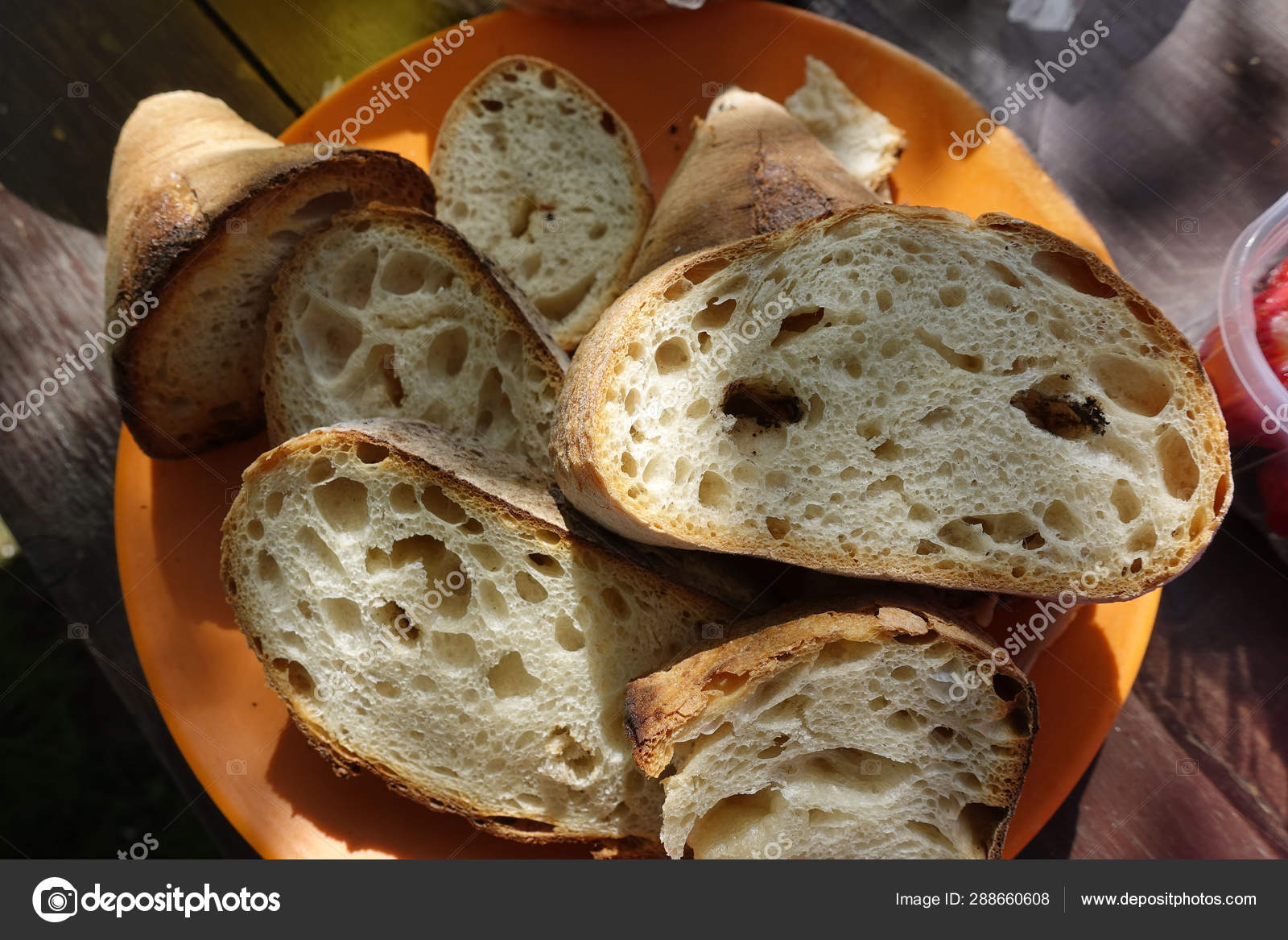 Toasted bread on the fire, cooked on skewers, illuminated by the sun ...