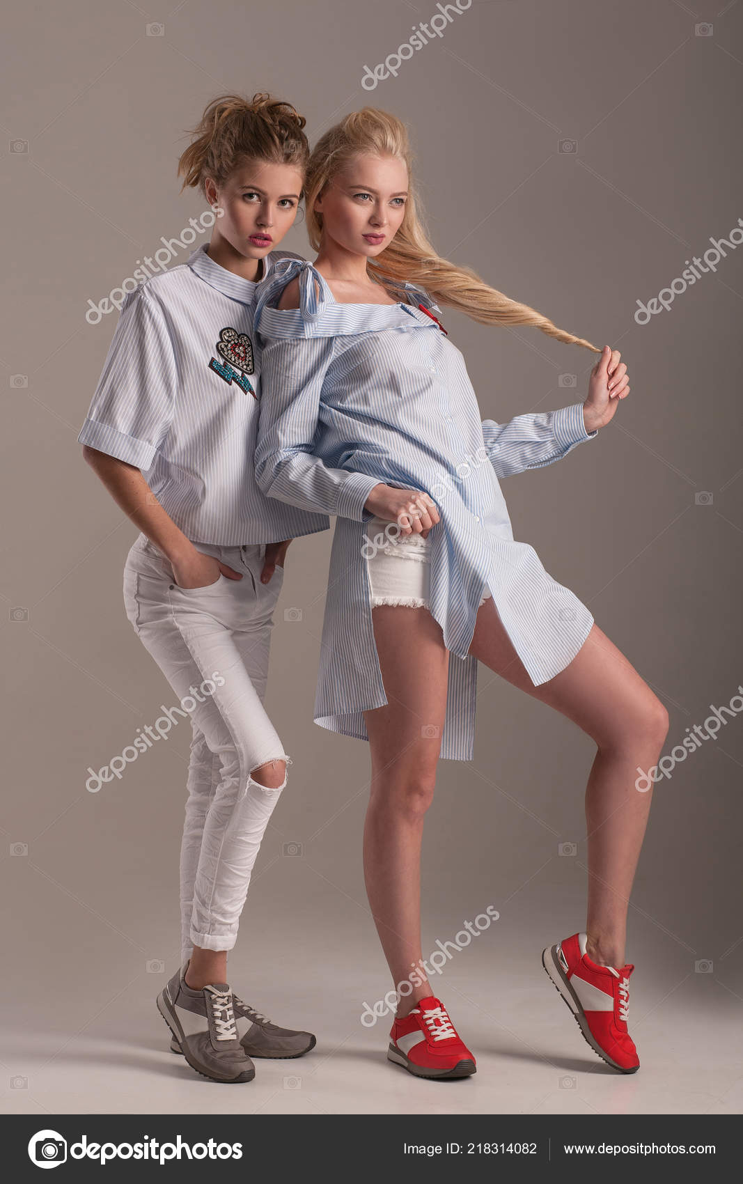 Two Blonde Models Blue Dress Blouse Jeans Snickers Shoes Posing Stock ...