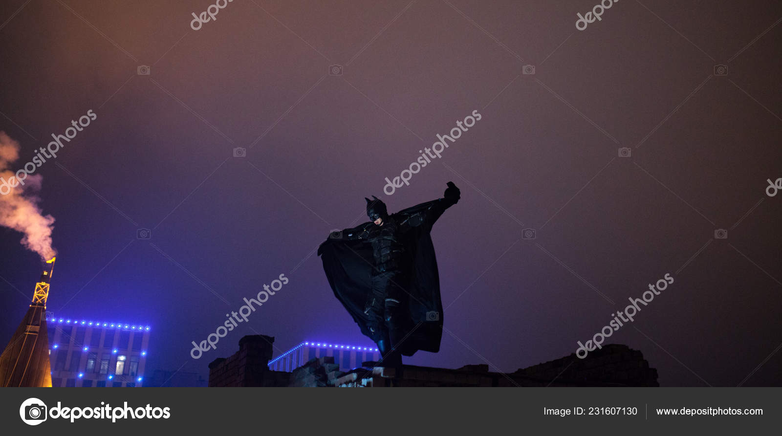 Man Dressed Bat Mask Helmet Armor Black Cloak Stands Top — Stock Photo ...