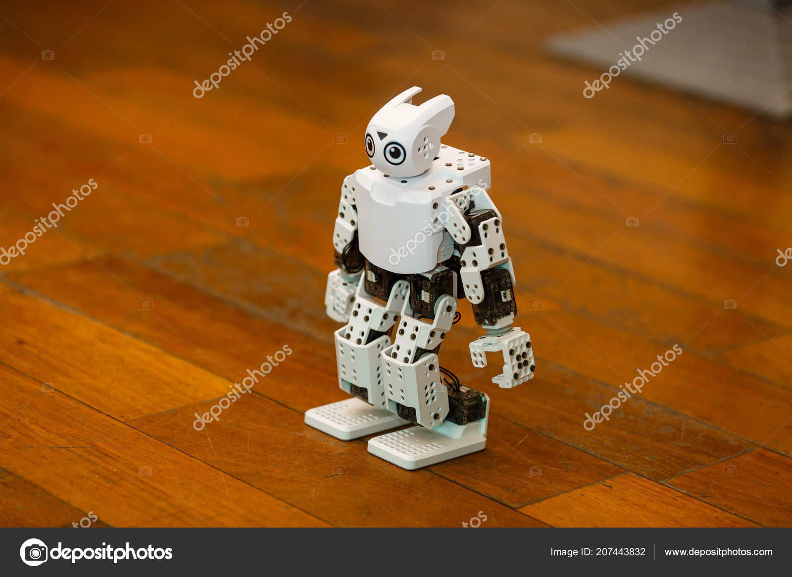 Plastic Robot Wooden Floor — Stock Photo © sinenkiy #207443832
