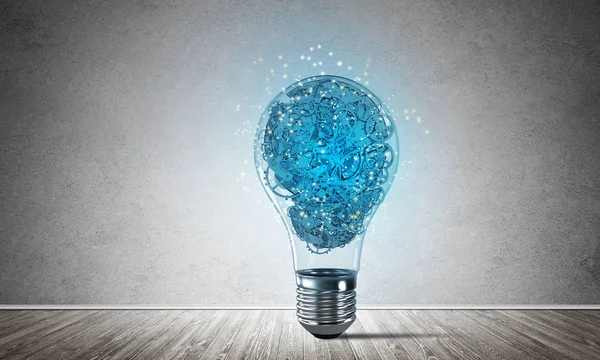 Blue glowing lightbulb with multiple gears inside placed in empty room ...