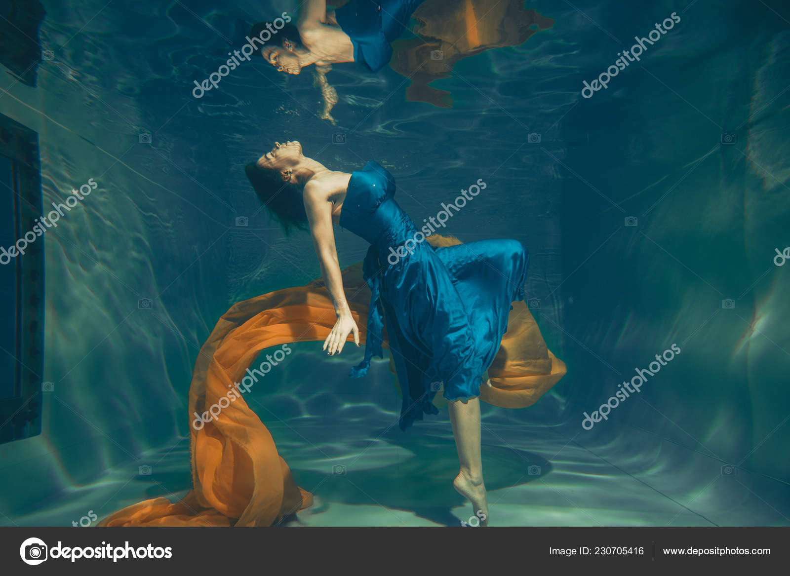 Cute Sporty Female Swims Underwater Free Diver Blue Evening Dress Stock