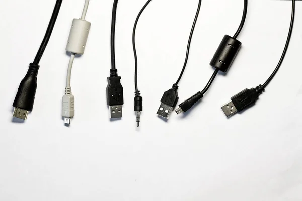 Various usb cables and plugs isolated against white fotos de stock ...