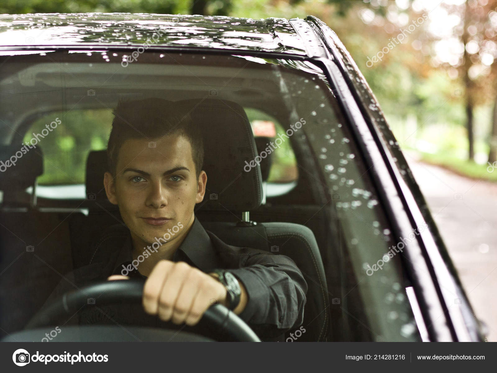 Man Driving Car Front View