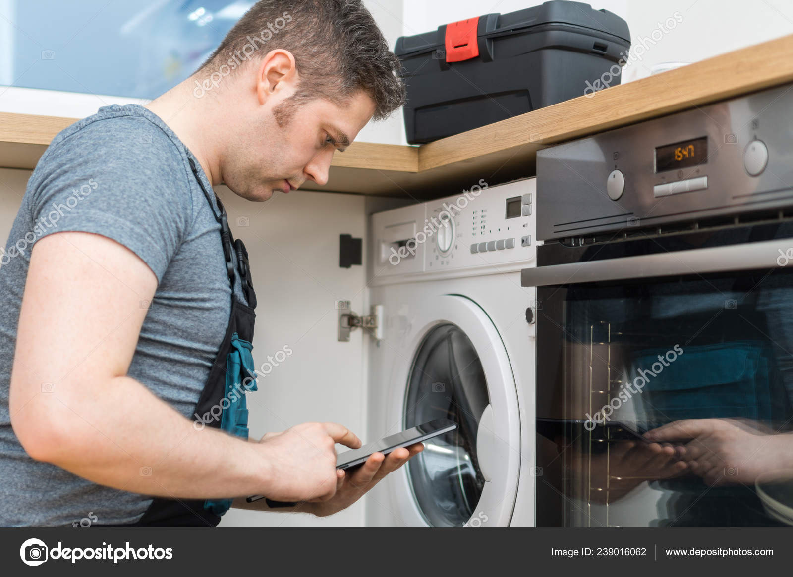 Handyman Doing Inspection Washing Machine Kitchen Stock Photo by ...