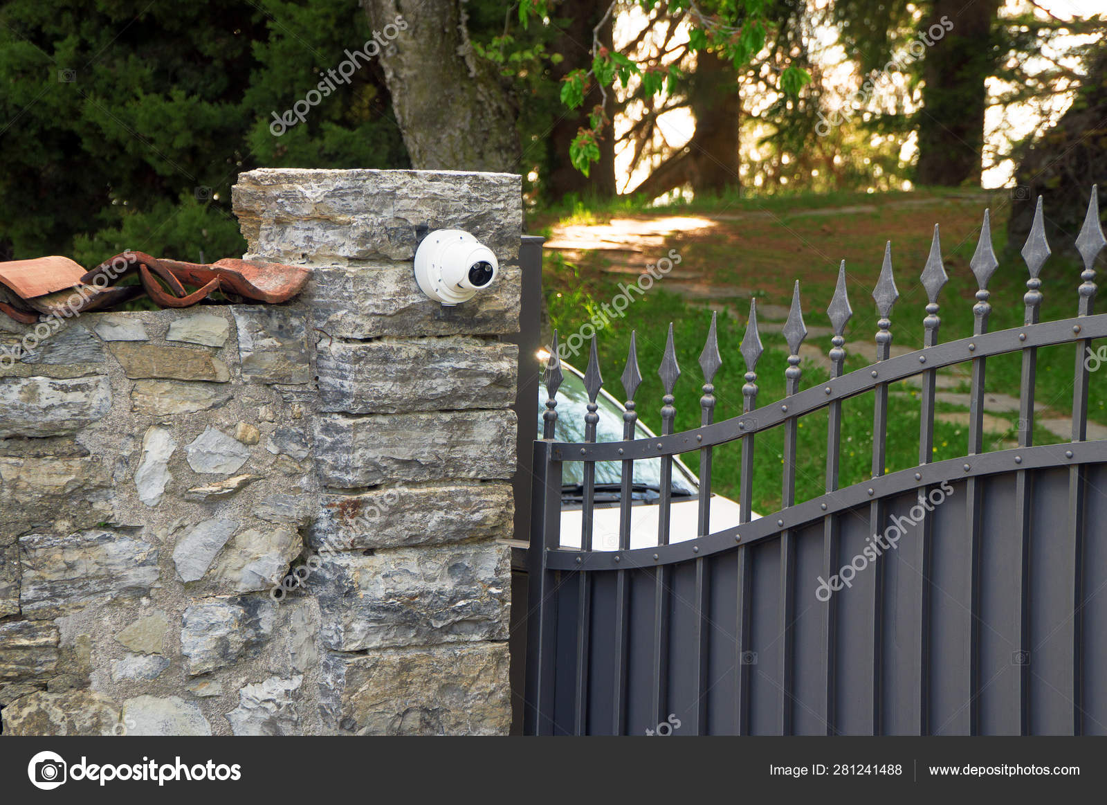Metal gates and security camera. Private property. Stock Photo by ...
