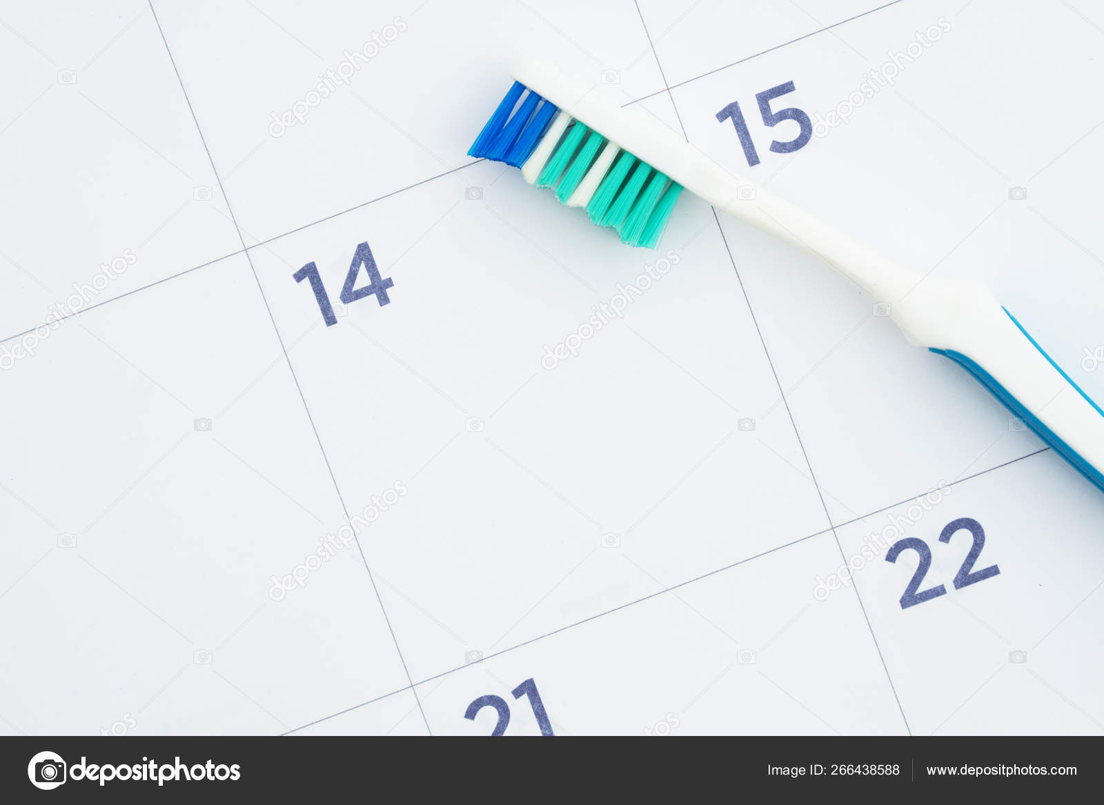 Monthly calendar with a toothbrush Stock Photo by ©karenr 266438588