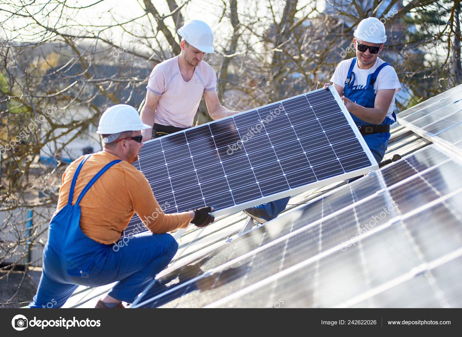 Male Engineers Installing Stand Alone Solar Photovoltaic Panel System ...