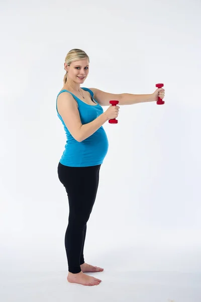 Femme enceinte 2c faire des exercices images libres de droit, photos de ...
