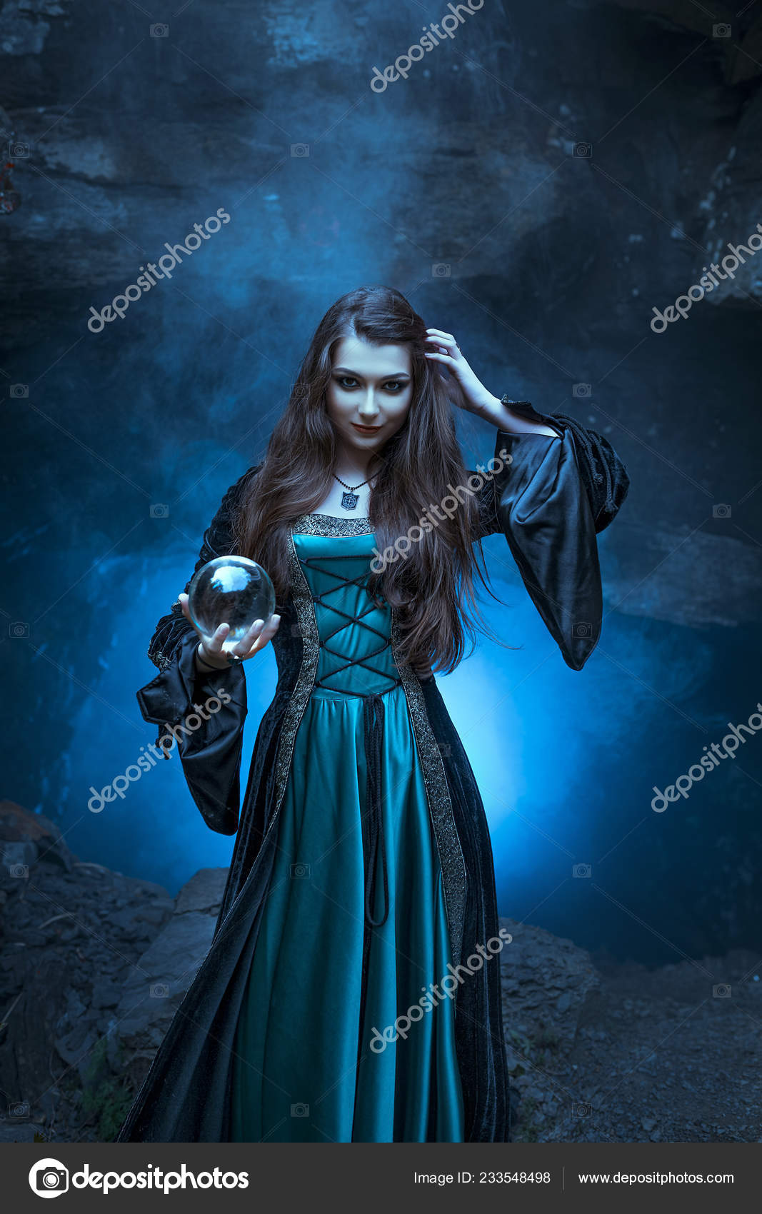 The witch with magic ball in her hands causes a spirits — Stock Photo ...