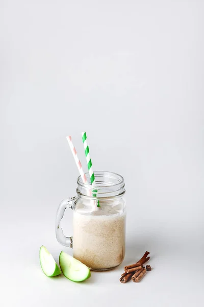 Cocktail protein, smoothie with apple, cinnamon in a glass. functional ...