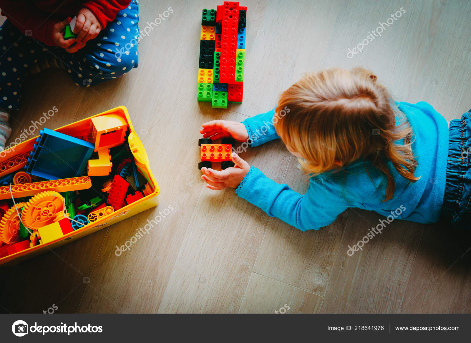 Kids play with plastic blocks, learning concept Stock Photo by ...