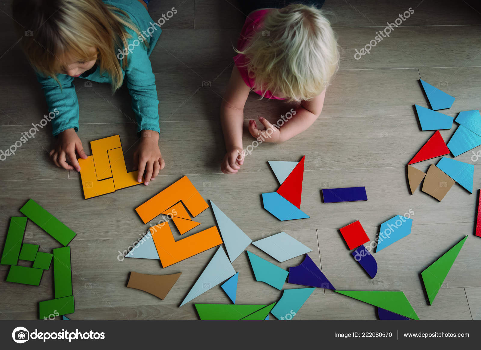 Kids play with puzzle, learn math, education concept Stock Photo by ...