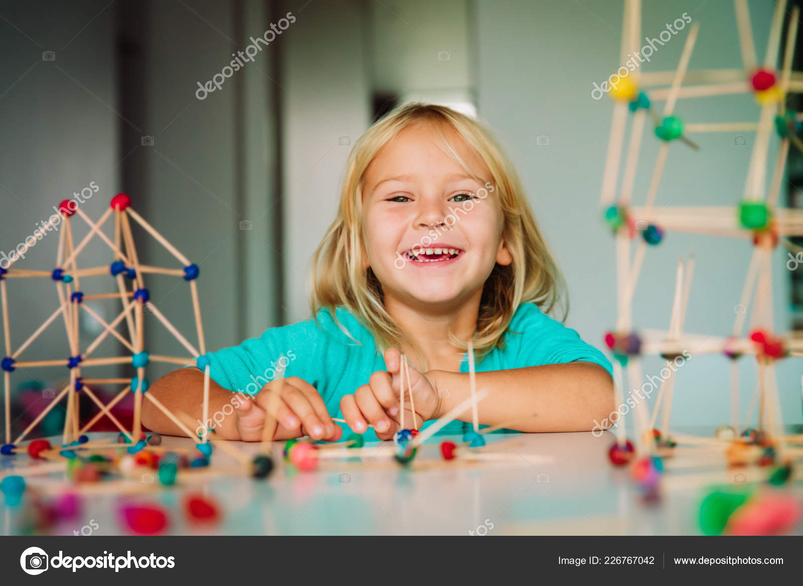 Child making geometric shapes, engineering and STEM Stock Photo by ...