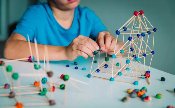 Child making geometric shapes, engineering and STEM — Stock Photo ...