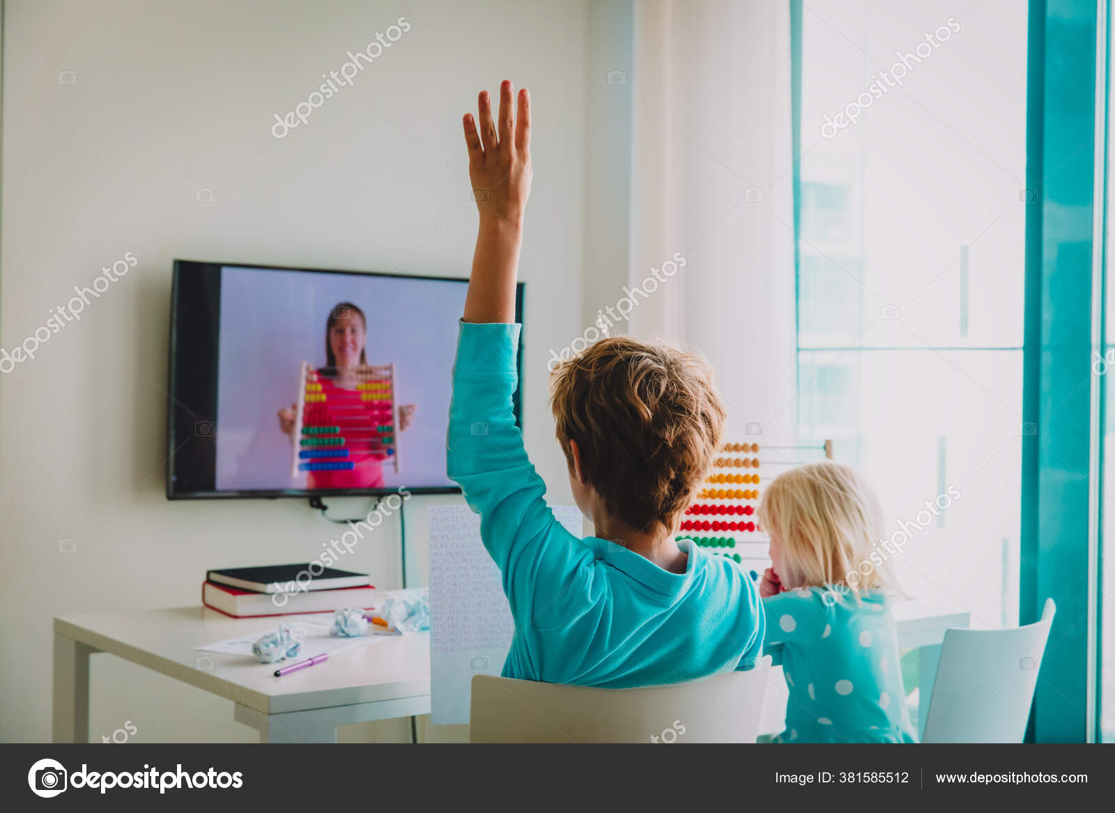 Kids learning at home, boy and girl doing online math lesson Stock ...