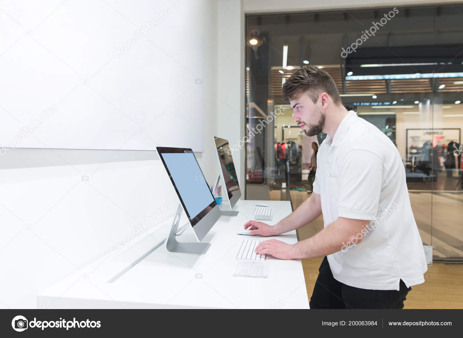 Man Uses Computer Modern Electronics Store Buyer Selects Monoblock ...