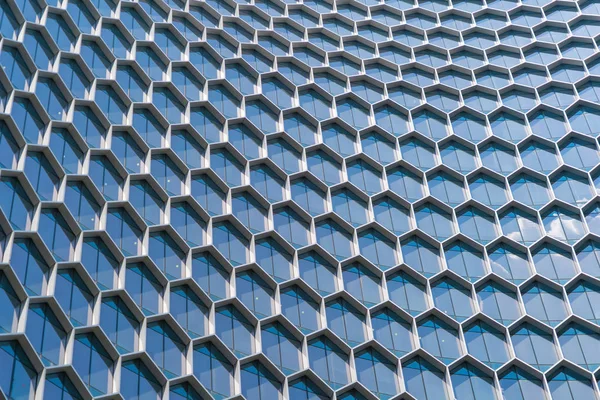 Office buildings. Structure of hexagon windows in futuristic tec Stock ...