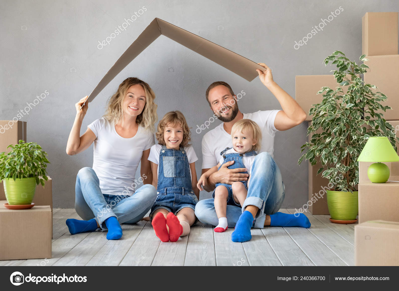 Happy Family Two Kids Playing New Home Father Mother Children Stock ...