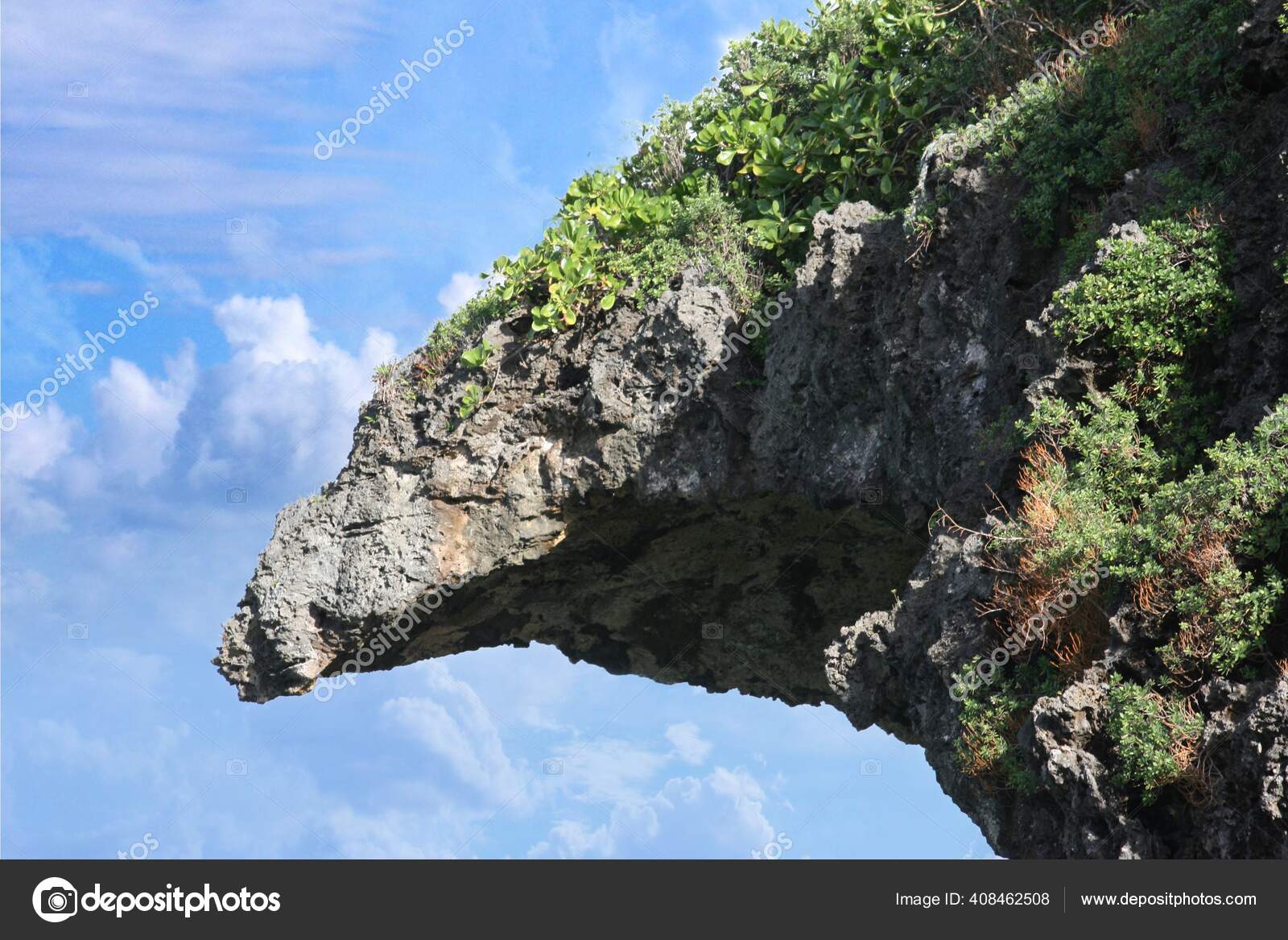 Sharp Edge Cliff Jutting Out Space Partially Covered Green Plants ⬇ ...