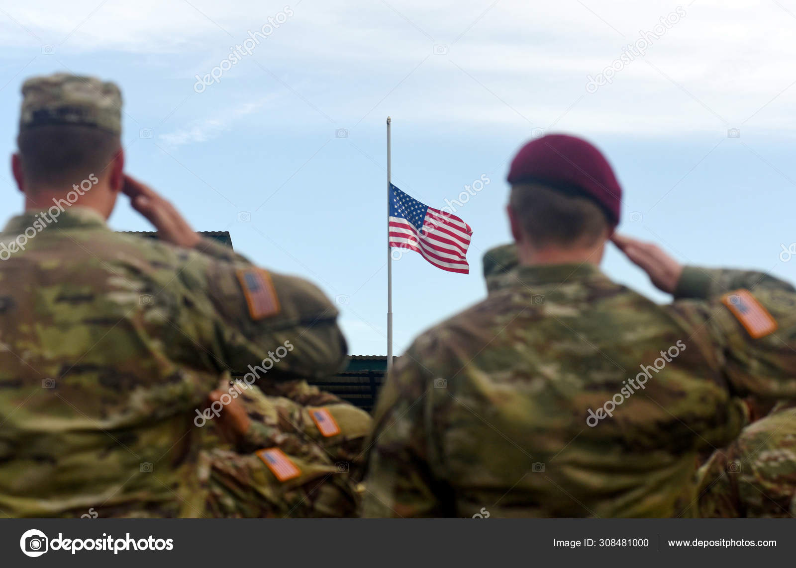 Soldiers Saluting The Flag