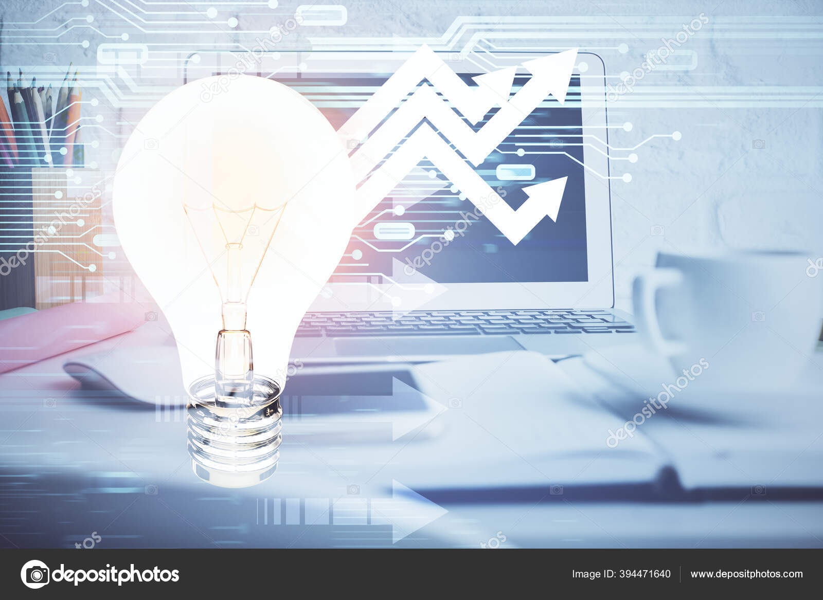 Computer on desktop in office with bulb icon hologram. Double exposure ...