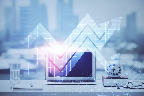 Computer on desktop with point up arrows hologram. Double exposure ...