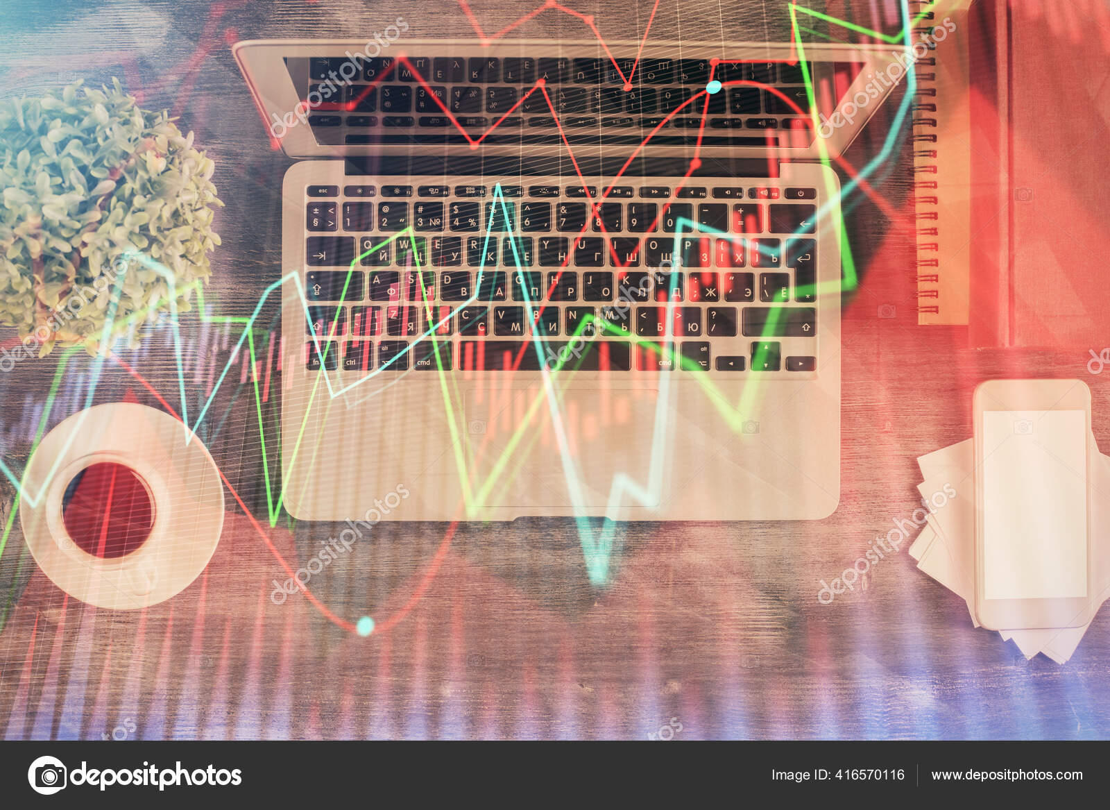 Stock market chart and top view computer on the table background. Multi ...
