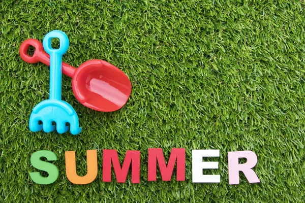summer background with letters on green grass - Stock Image - Everypixel