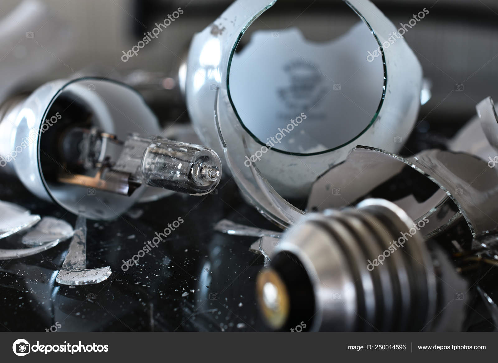 Close Image Broken Light Bulb Black Reflective Surface Stock Photo by ...